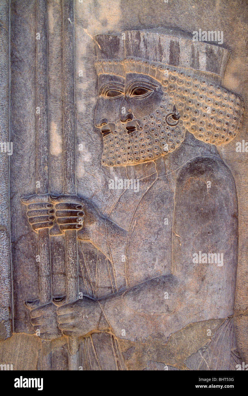 Relief sculpture of bearded men (palace guards) at Apadana Palace ...
