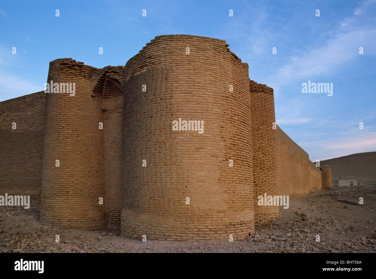Brick Mosque in the desert under sunset, Mashhad, Iran Stock Photo - Alamy