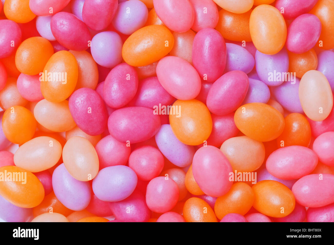 jelly beans multi colored backdrop or background Stock Photo - Alamy