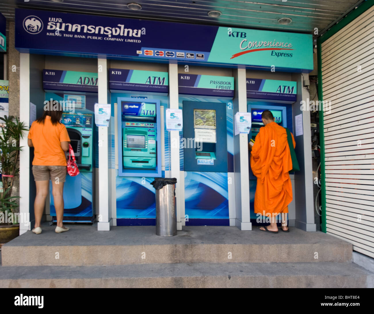 Cash for the Monk Stock Photo - Alamy
