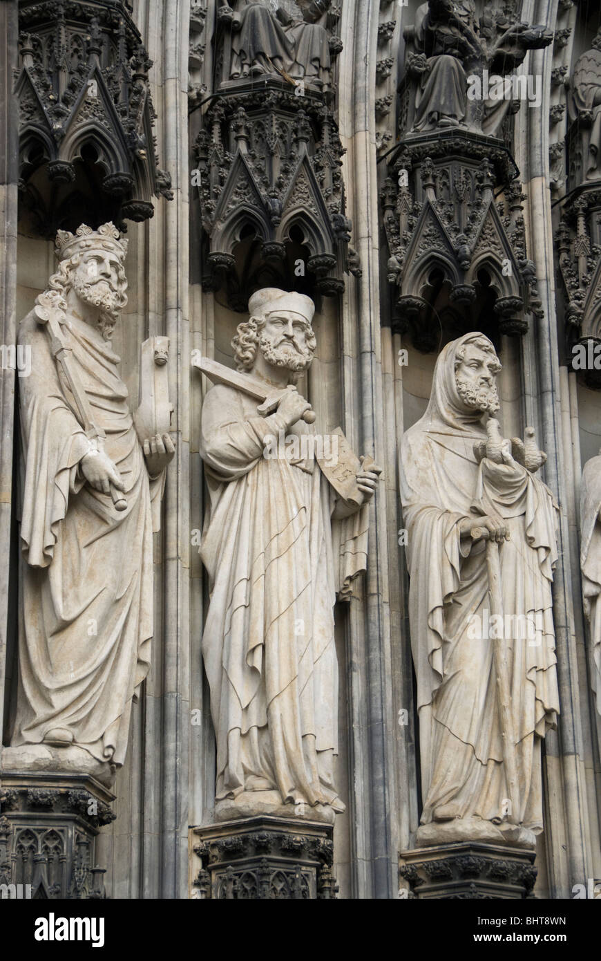 Statues around doorway of Cologne Cathedral, Cologne, Germany Stock ...