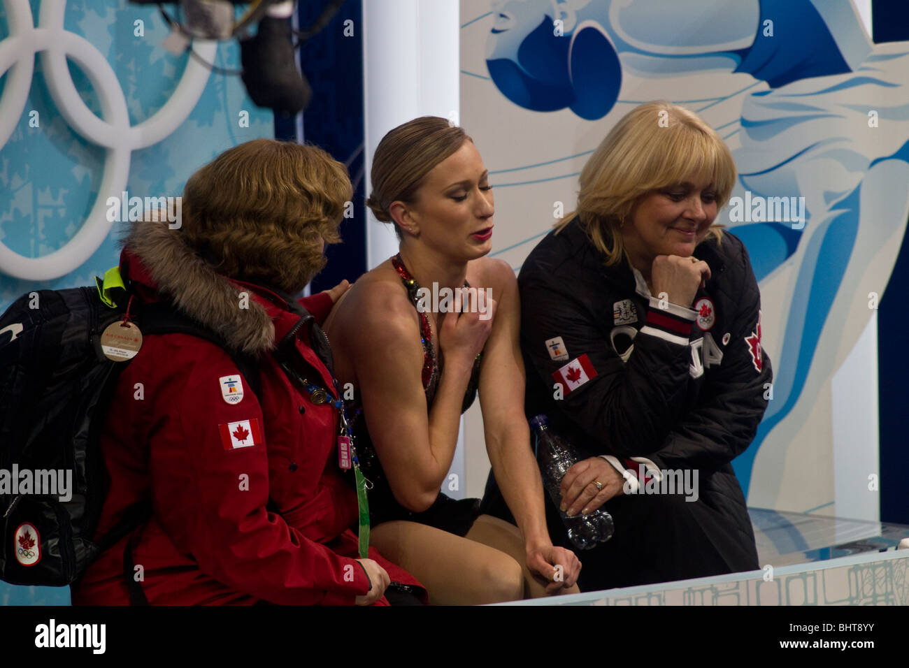 Joannie Rochette (CAN) with her coach Manon Perron in the kiss and cry ...