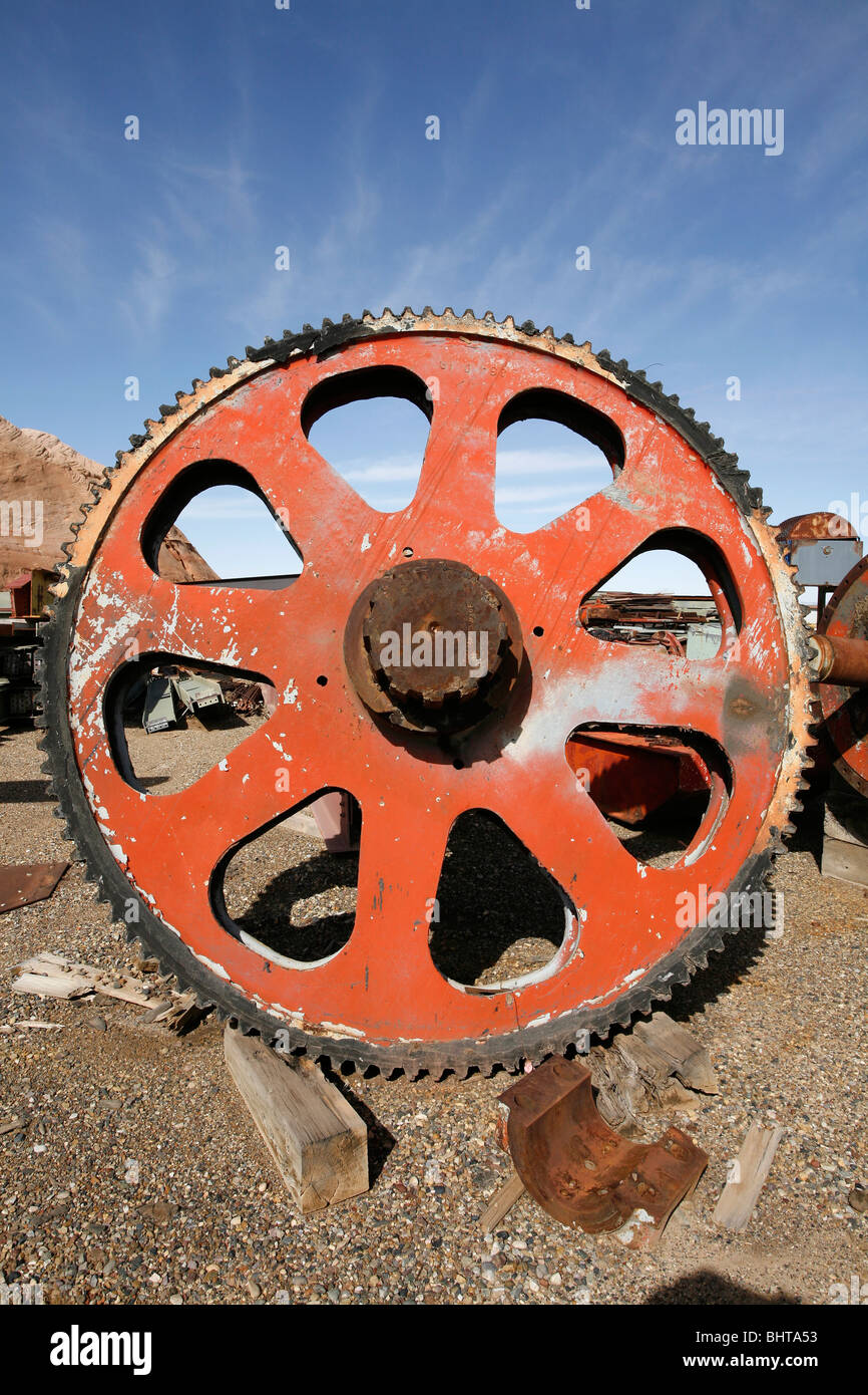 Gigantic industrial gear in scrap yard Stock Photo - Alamy