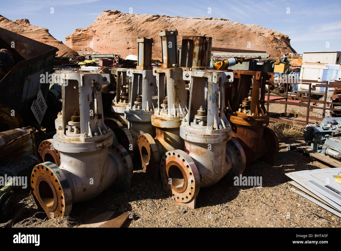 Large industrial valves in scrap metal yard Stock Photo - Alamy