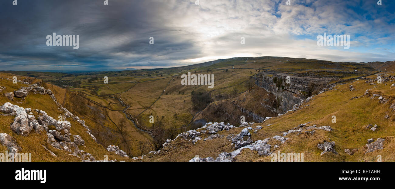A panorama of malham cove and the surrounding area. The huge cliff face ...