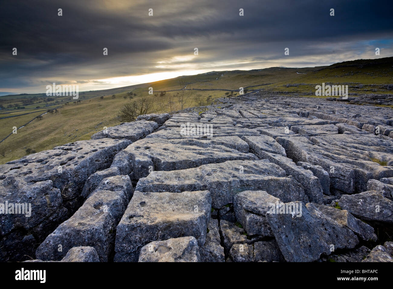 Limestone pavement above Malham Cove on a winter evening Stock Photo ...