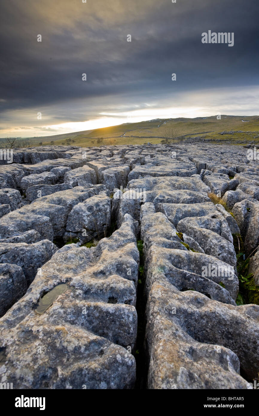 Limestone pavement above Malham Cove on a winter evening Stock Photo ...