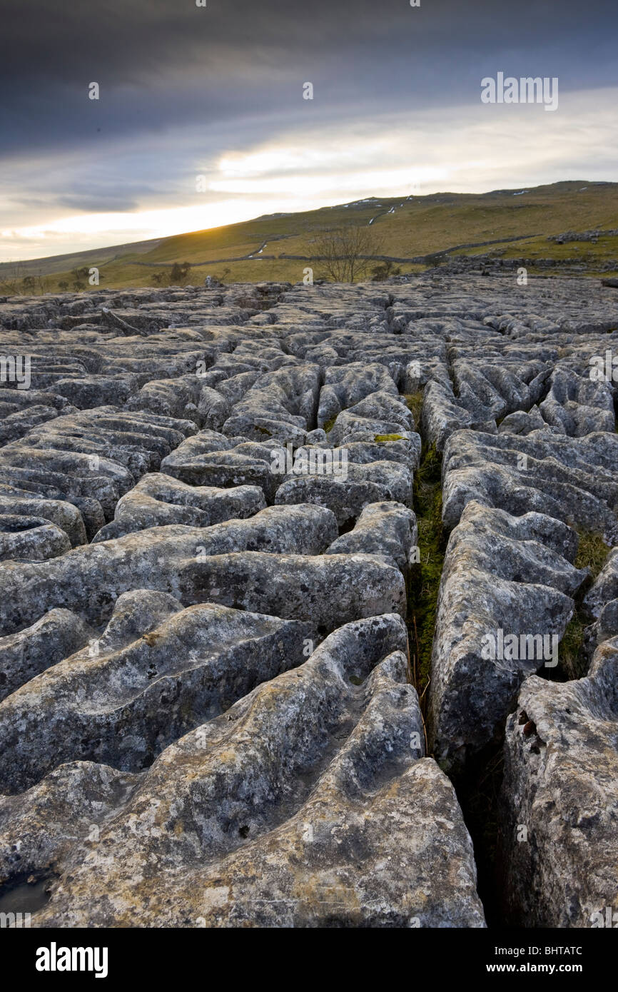 Limestone pavement above Malham Cove on a winter evening Stock Photo ...