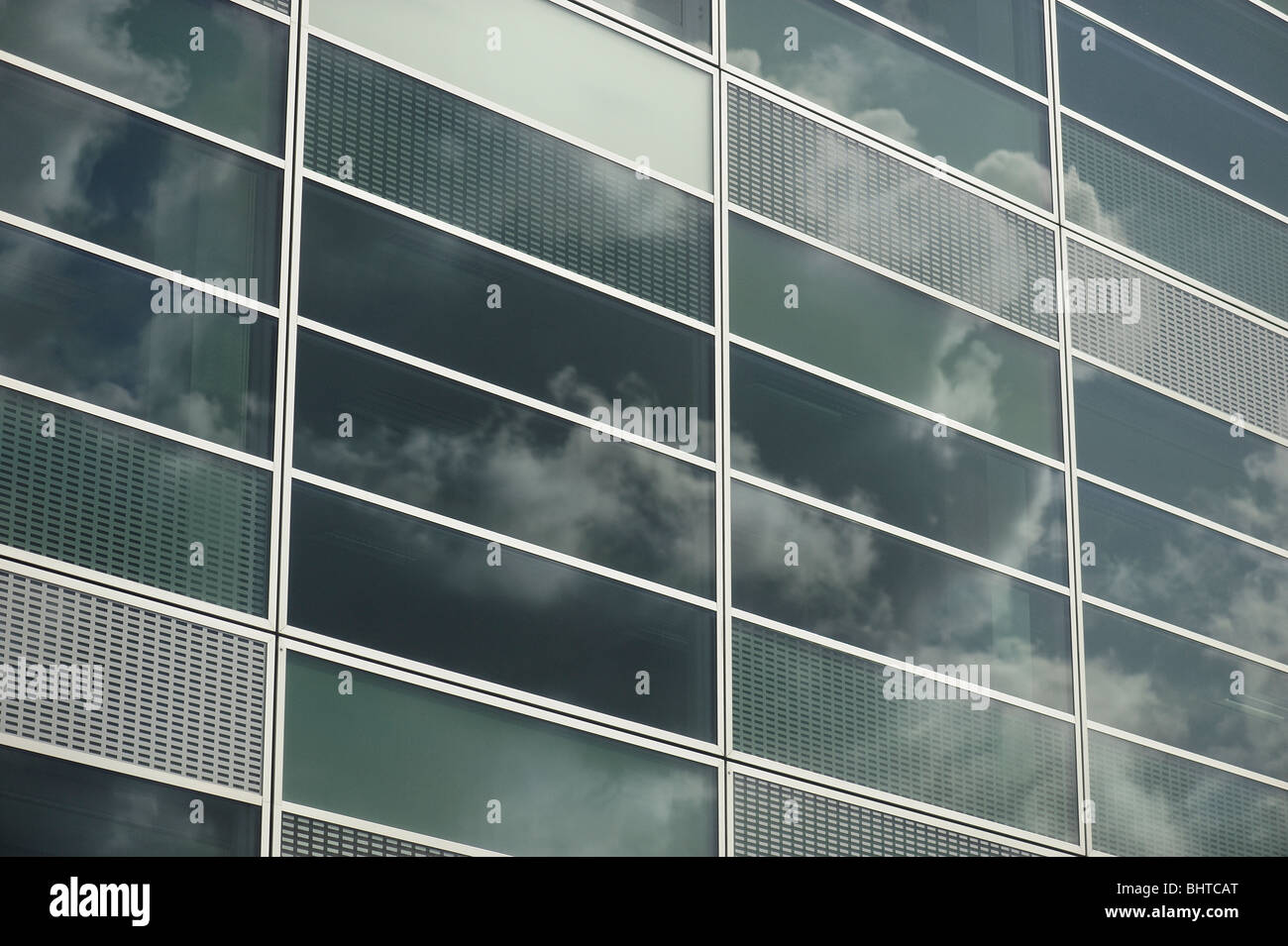Clouds reflect in windows hi-res stock photography and images - Alamy