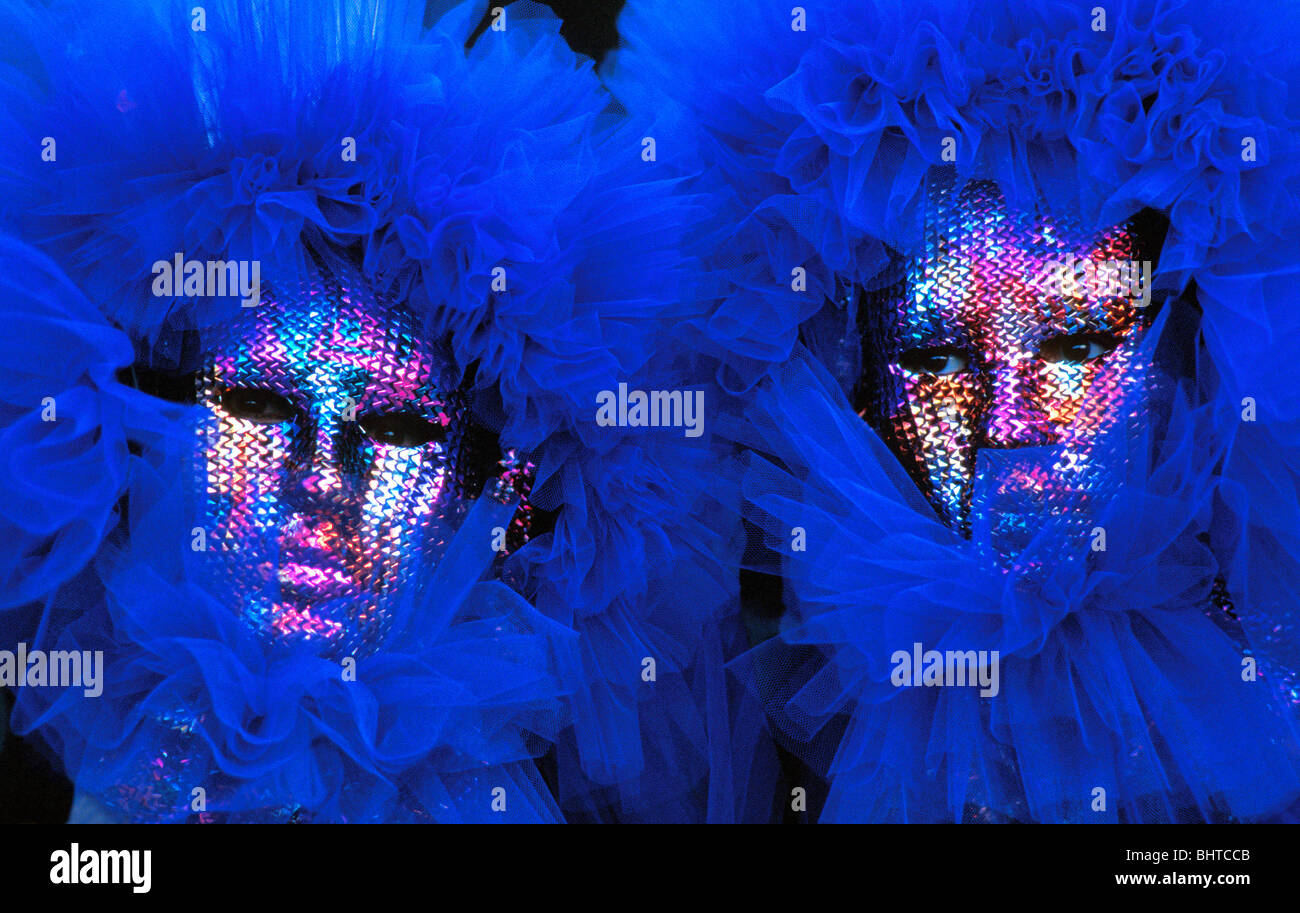 Multi coloured metallic masks surrounded by blue frills at the 1993 ...
