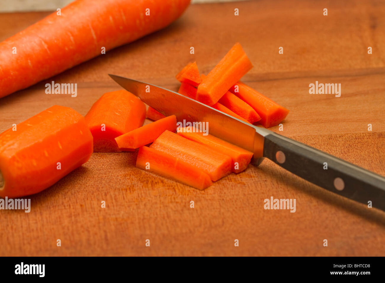 Chopping carrots hi-res stock photography and images - Alamy