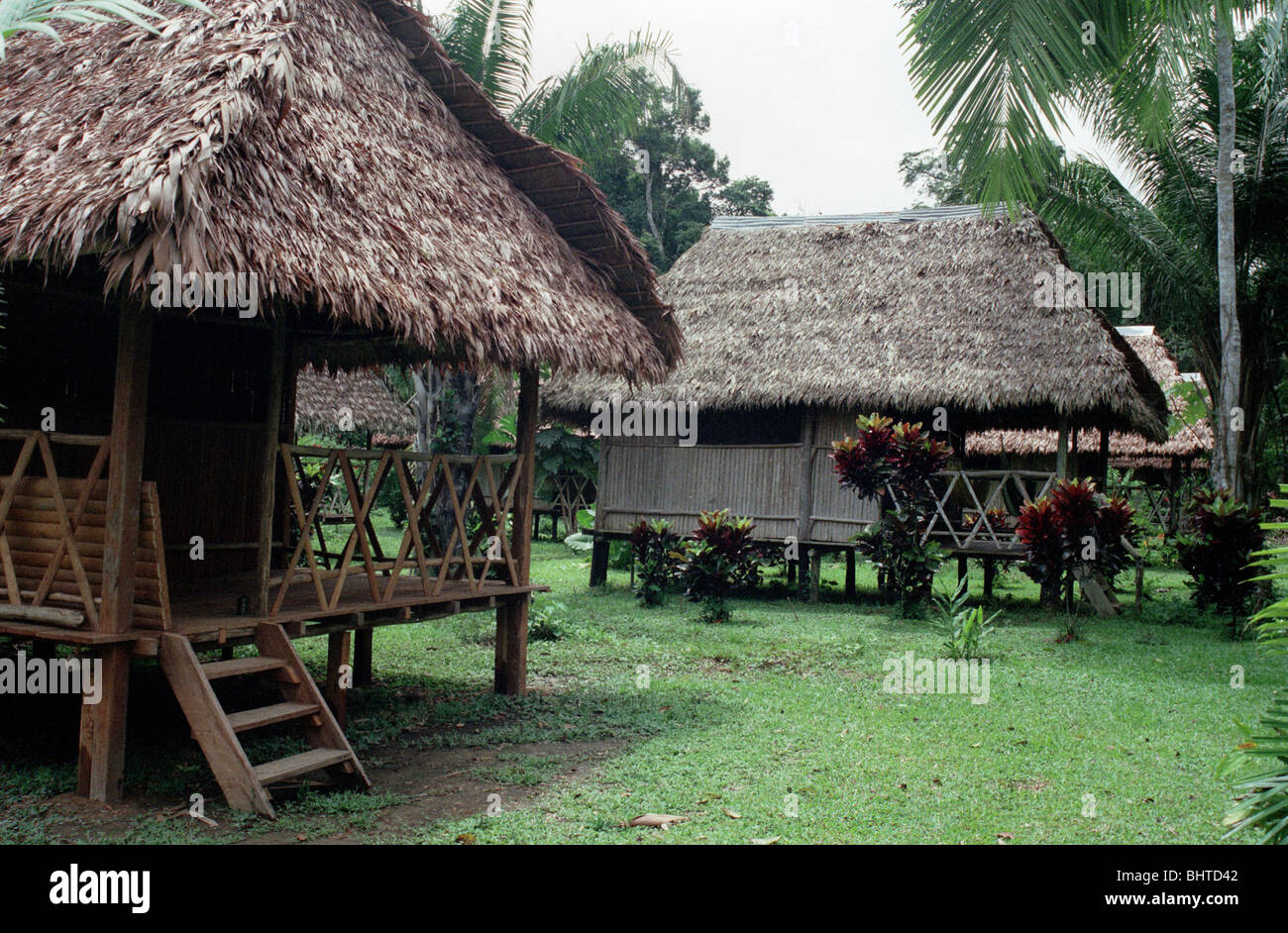wooden huts on Rolin Island in the Peruvian Amazon South America Stock ...