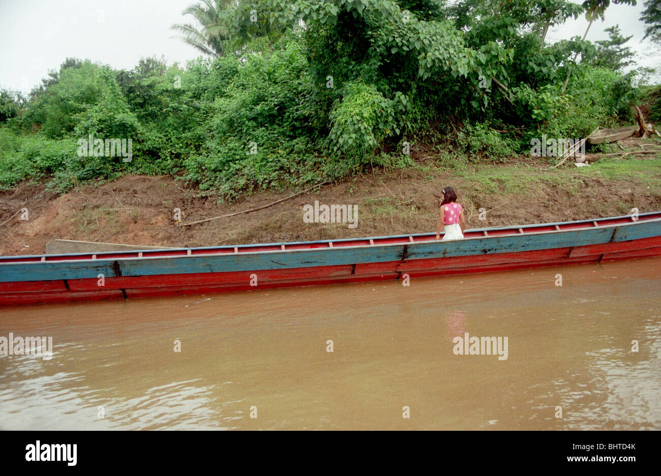 Girl on canoe on the Peruvian Amazon River Stock Photo - Alamy