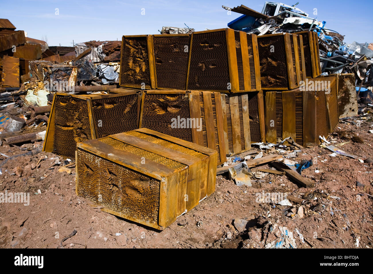 Large rusty scrap metal cooling units at scrap metal yard Stock Photo ...