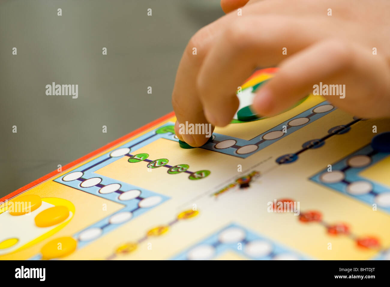 Funny board game played with colored buttons Stock Photo - Alamy