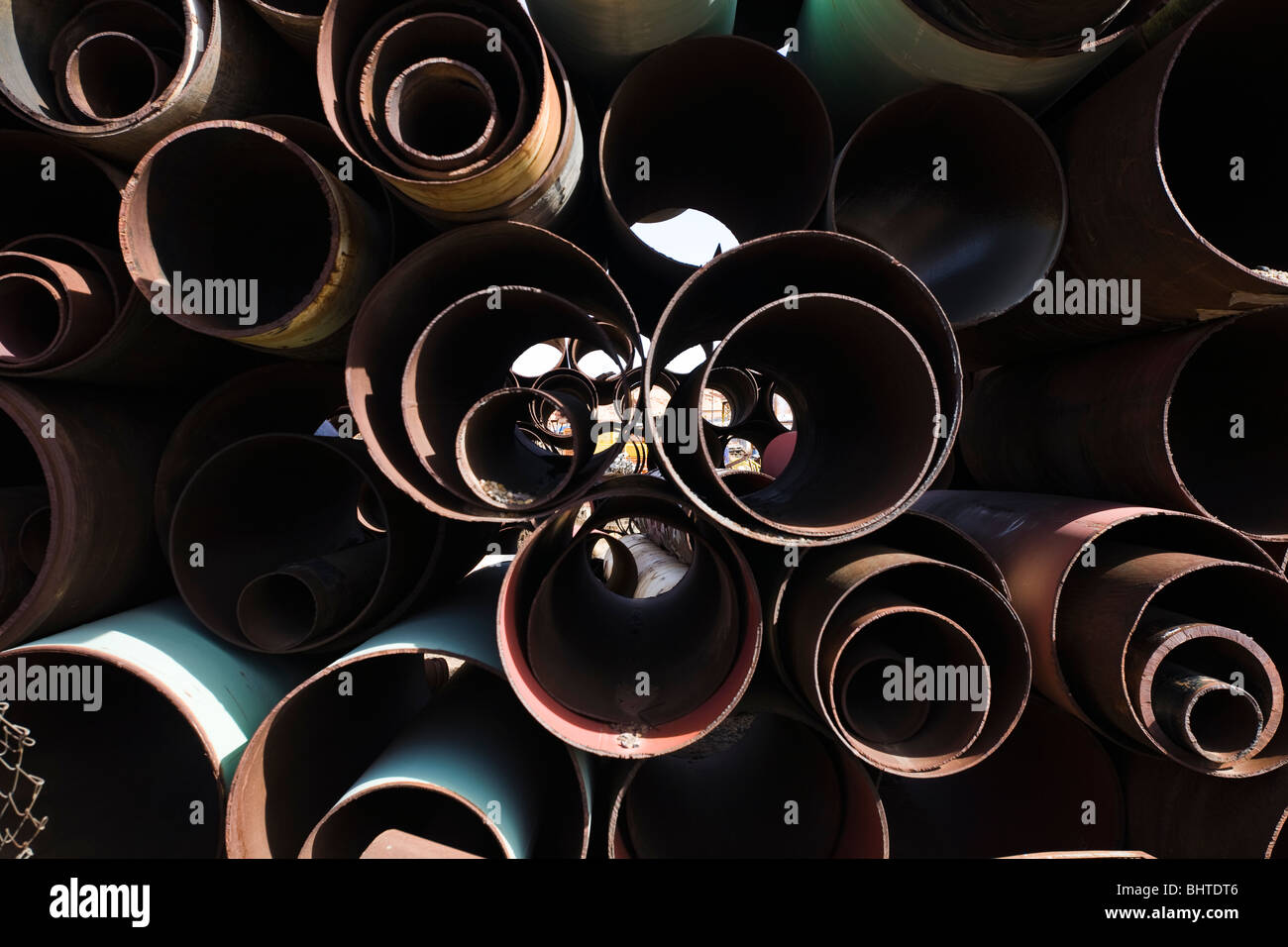 Large used scrap metal pipes, at scrap metal yard Stock Photo - Alamy
