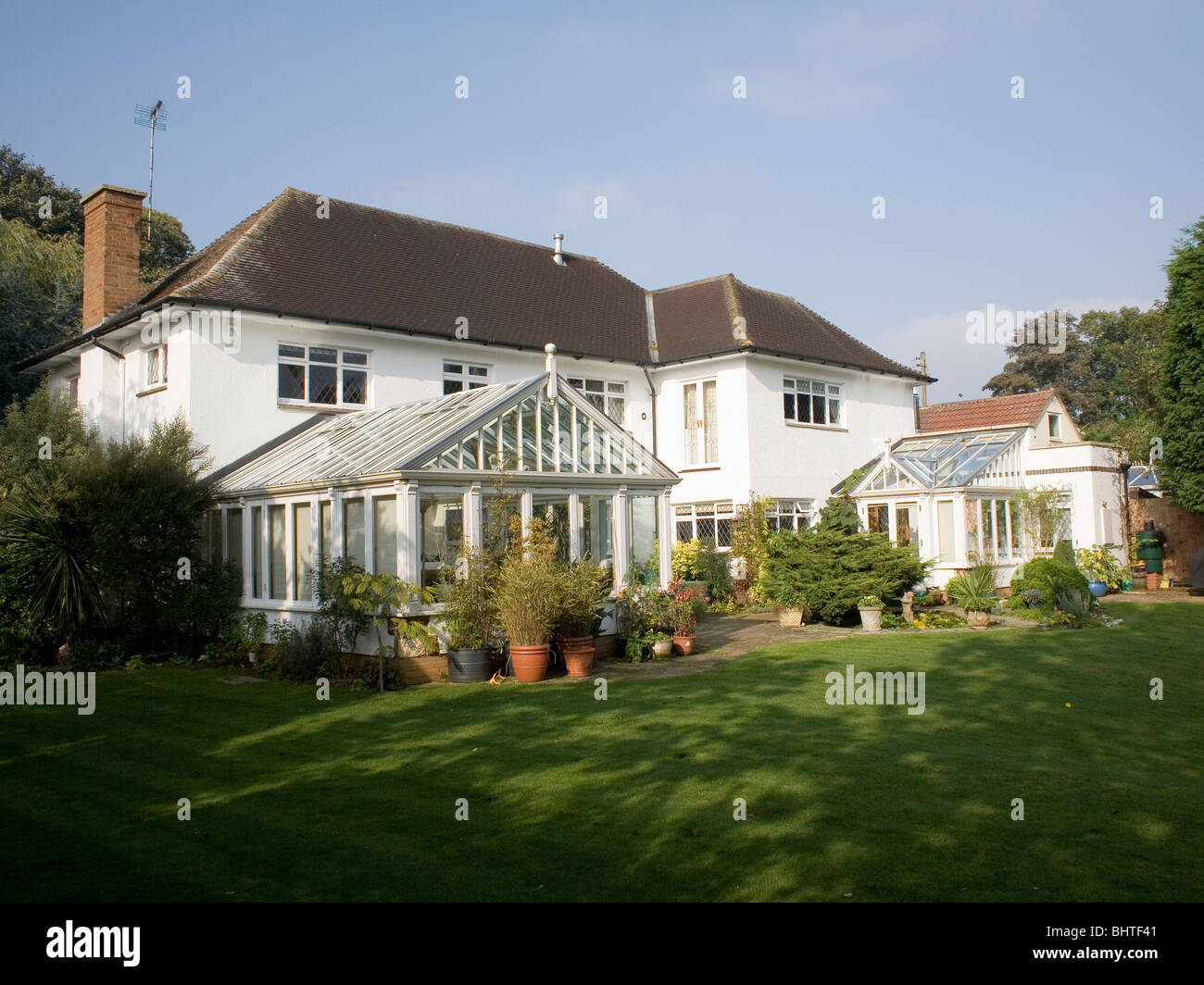 Large detached traditional white house with conservatory extension ...