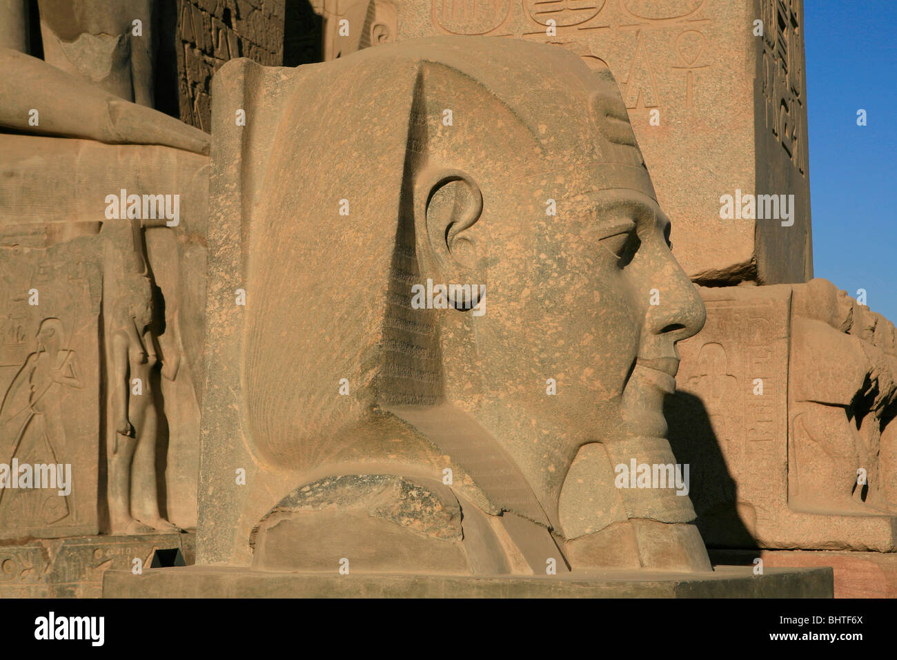 Close-up of the face of Ramesses II near the entrance of the first ...