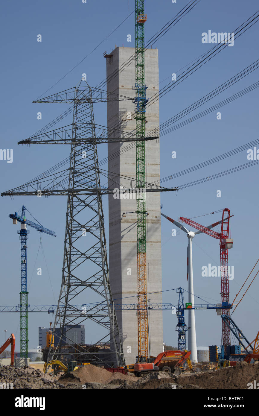 Construction site with electricity pylon Stock Photo - Alamy