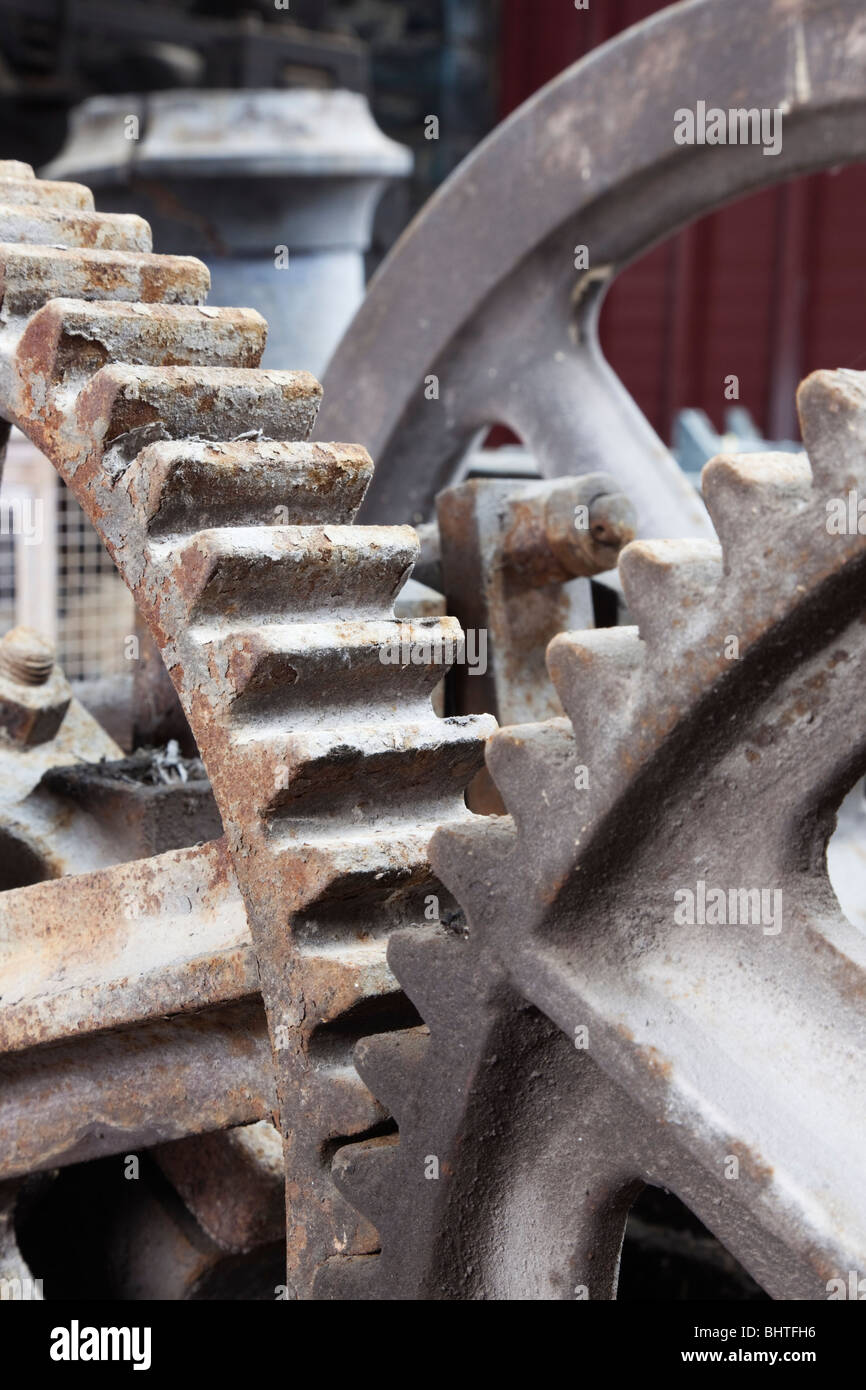 Industrial cog wheels gears interlocking Stock Photo - Alamy