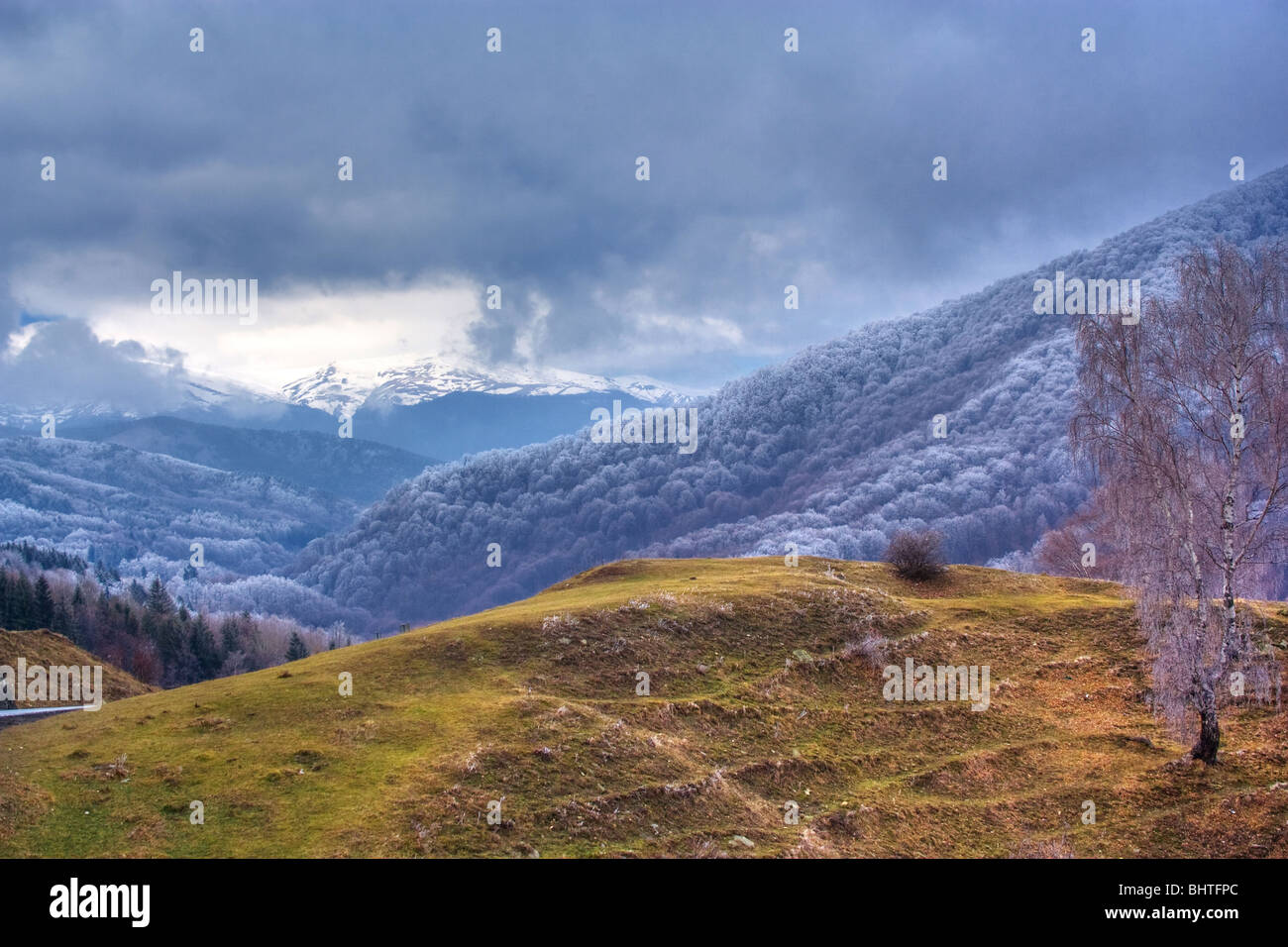 High dynamic range landscape with mountains in a cloudy day Stock Photo ...