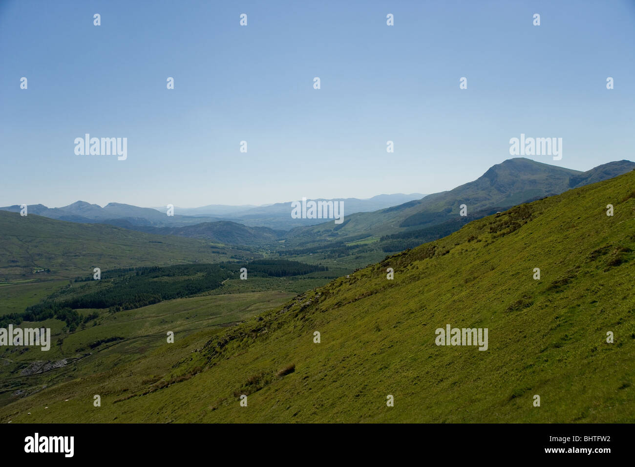 Beddgelert Forest from Nantlle Ridge above the village of Rhyd Ddu in ...