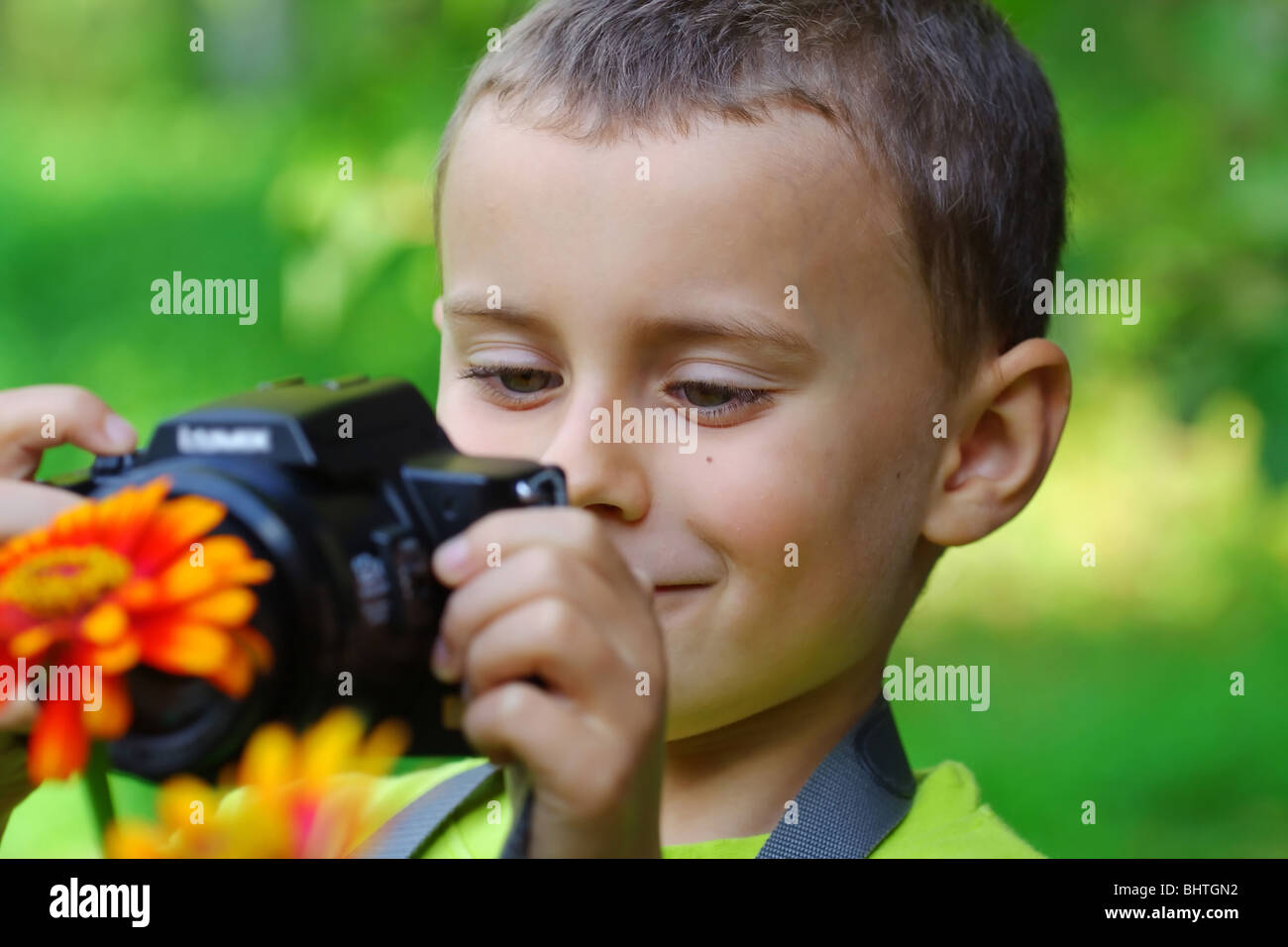 Child taking photos Stock Photo - Alamy