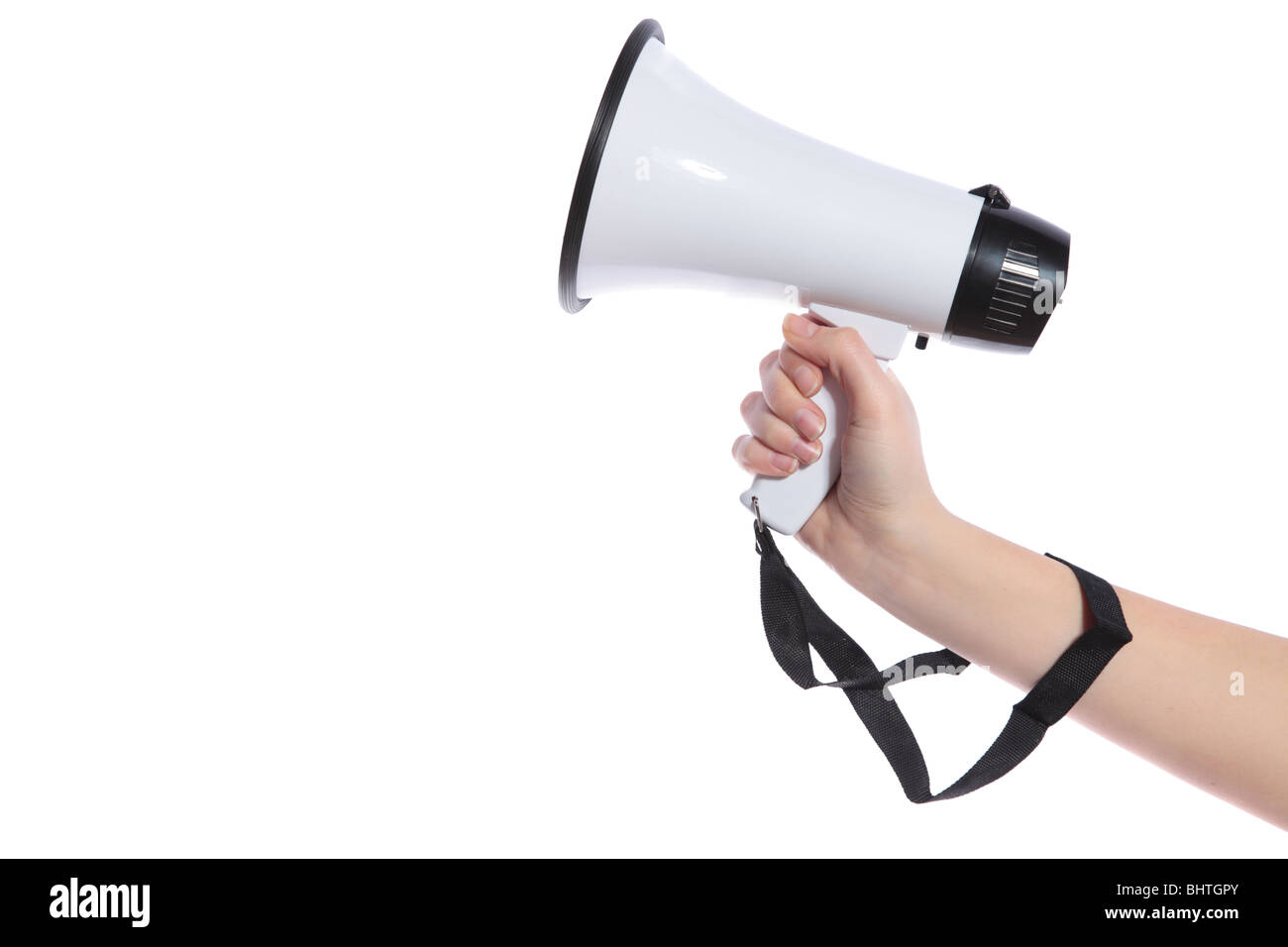 A human hand holding a standard megaphone. All isolated on white ...