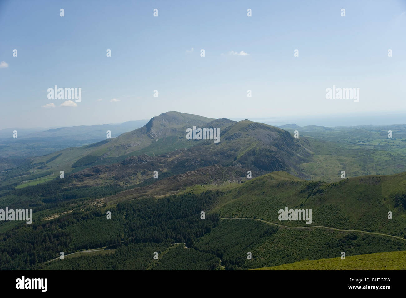 Moel Hebog and Beddgelert Forest from Nantlle Ridge above the village ...