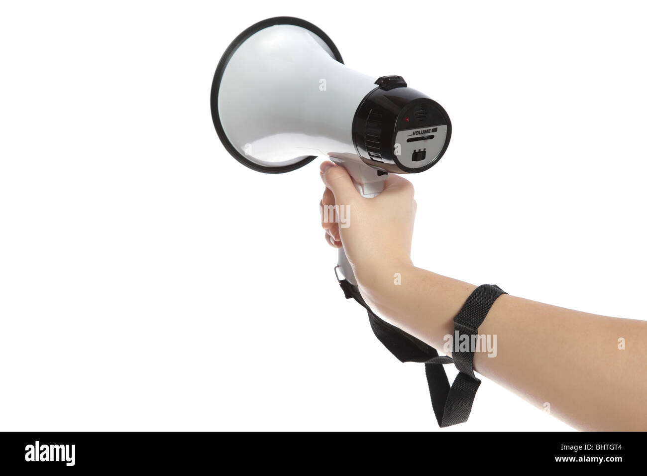 A neat human hand holding a standard megaphone. All isolated on white ...