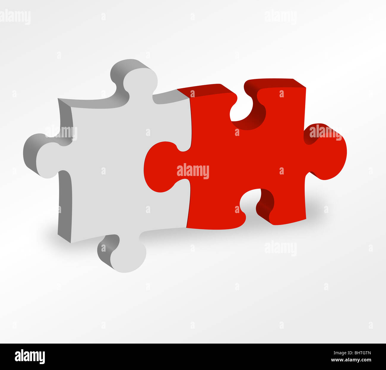 Two pieces of a puzzle sticking together Stock Photo - Alamy
