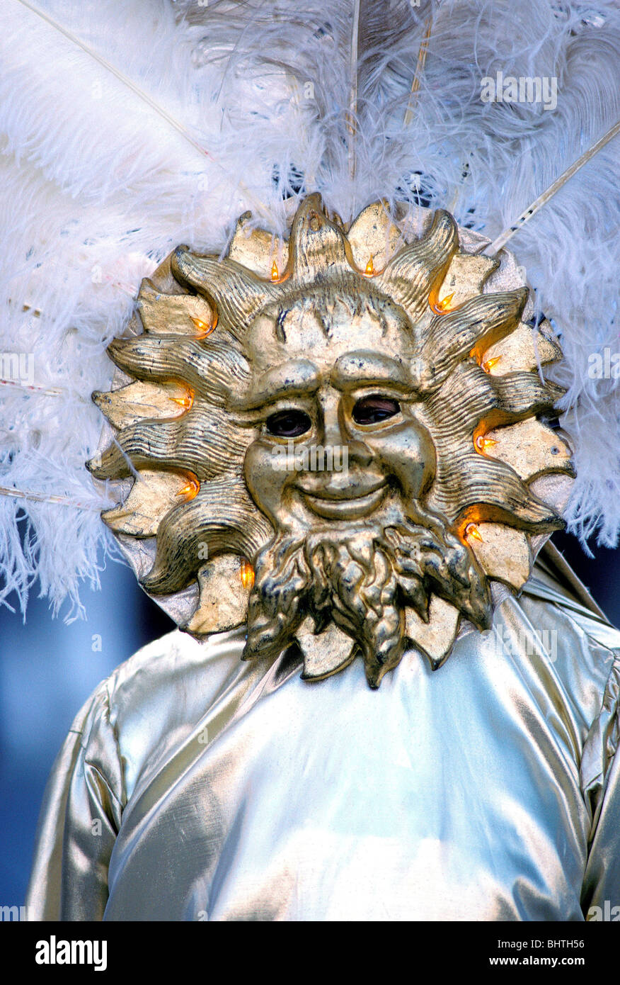 Person wearing a traditional masquerade sun mask at Venice Carnival ...