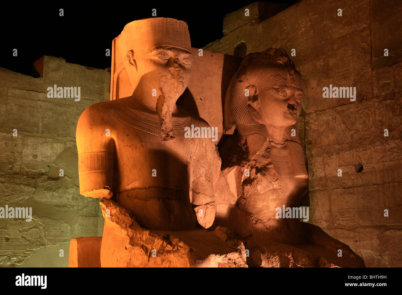 Illuminated statues of Tutankhamun and his wife Ankhesenamun at the ...