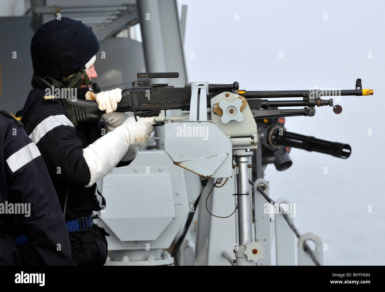 “Royal Navy" general purpose machine gunner on HMS Albion, UK Stock ...