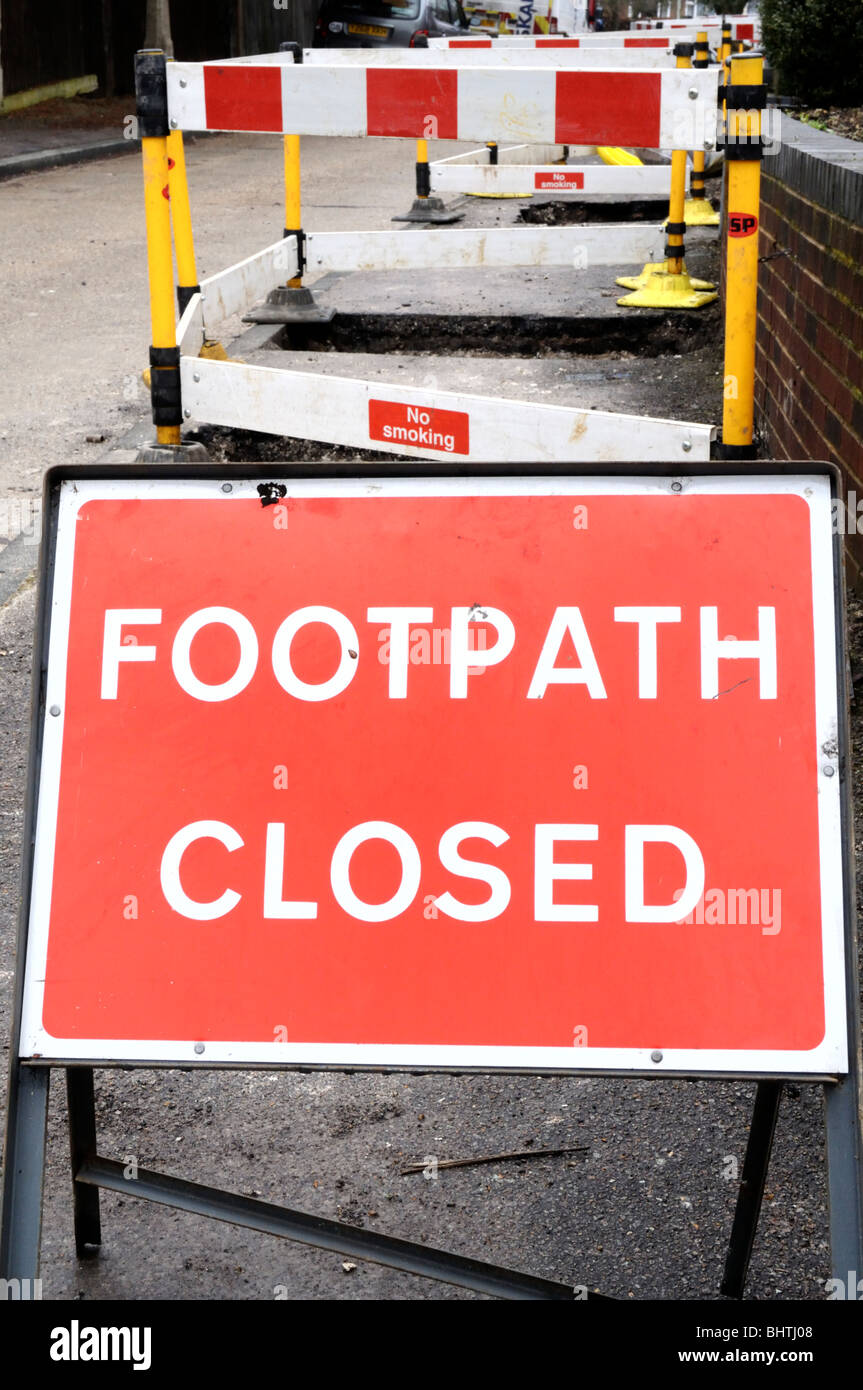 Footpath closed during work to replace metal with plastic gas pipe ...