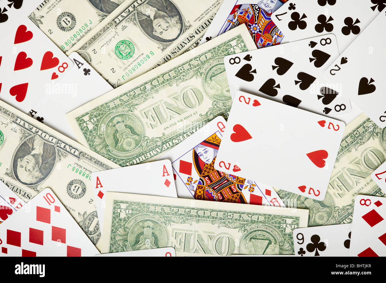 Background of money and playing cards about gambling Stock Photo - Alamy