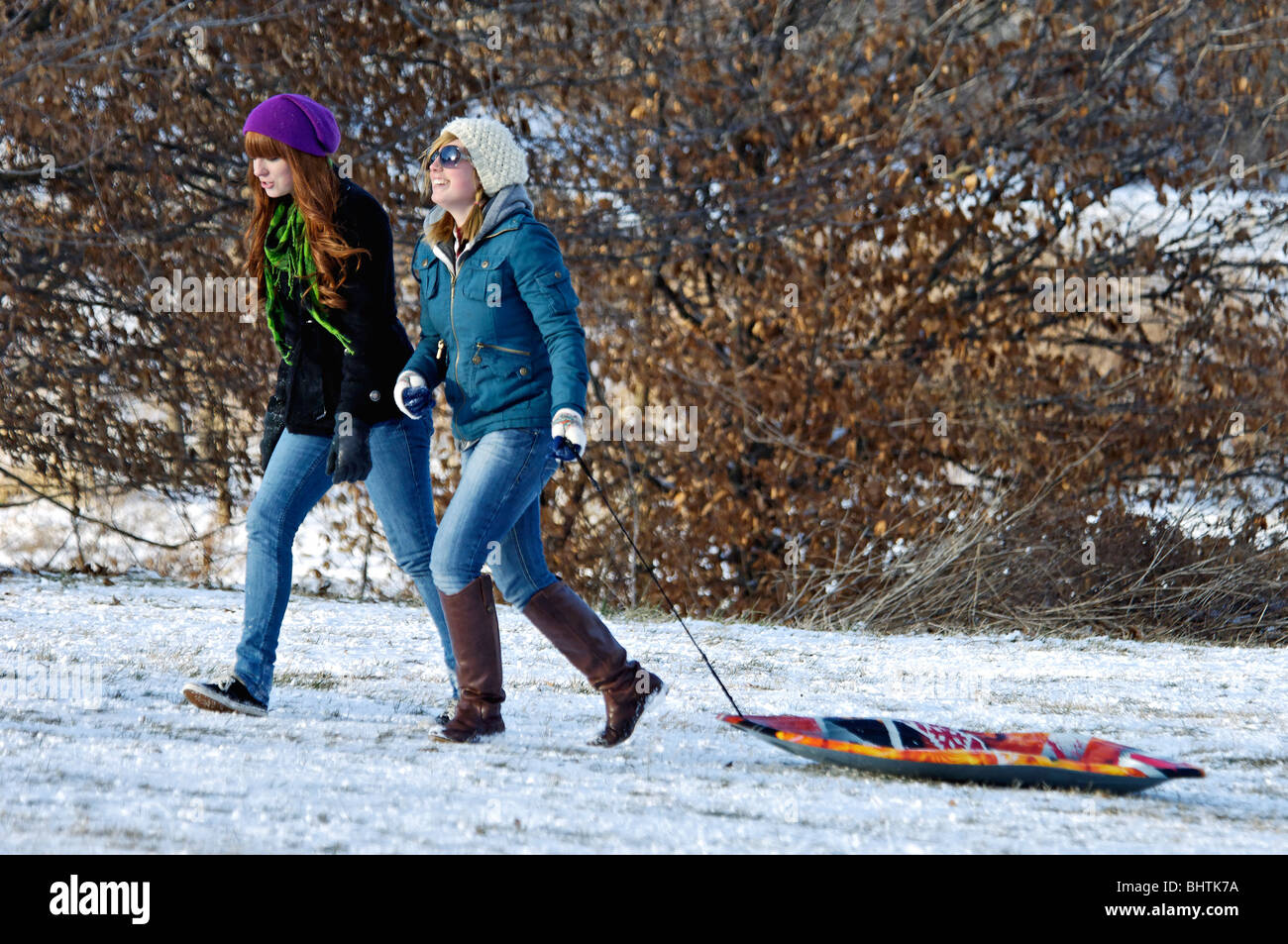 Two Teenage Girls with Sled in Cherokee Park in Louisville, Kentucky ...