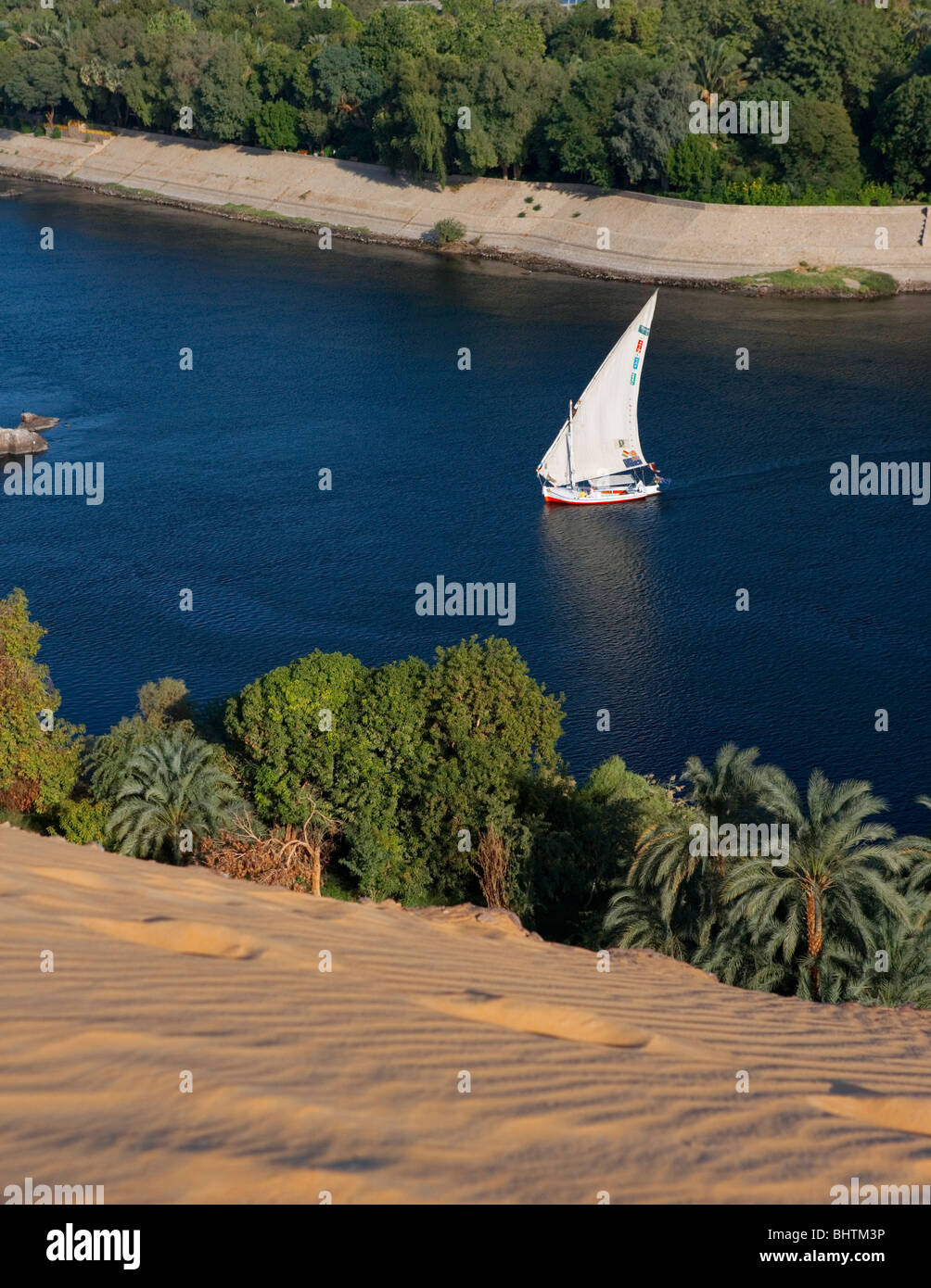 Traditional Felucca sailing on the river Nile in Aswan, Egypt Stock ...