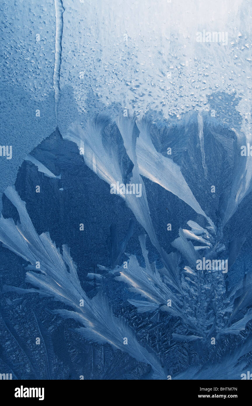 Icy pattern on glass Stock Photo - Alamy