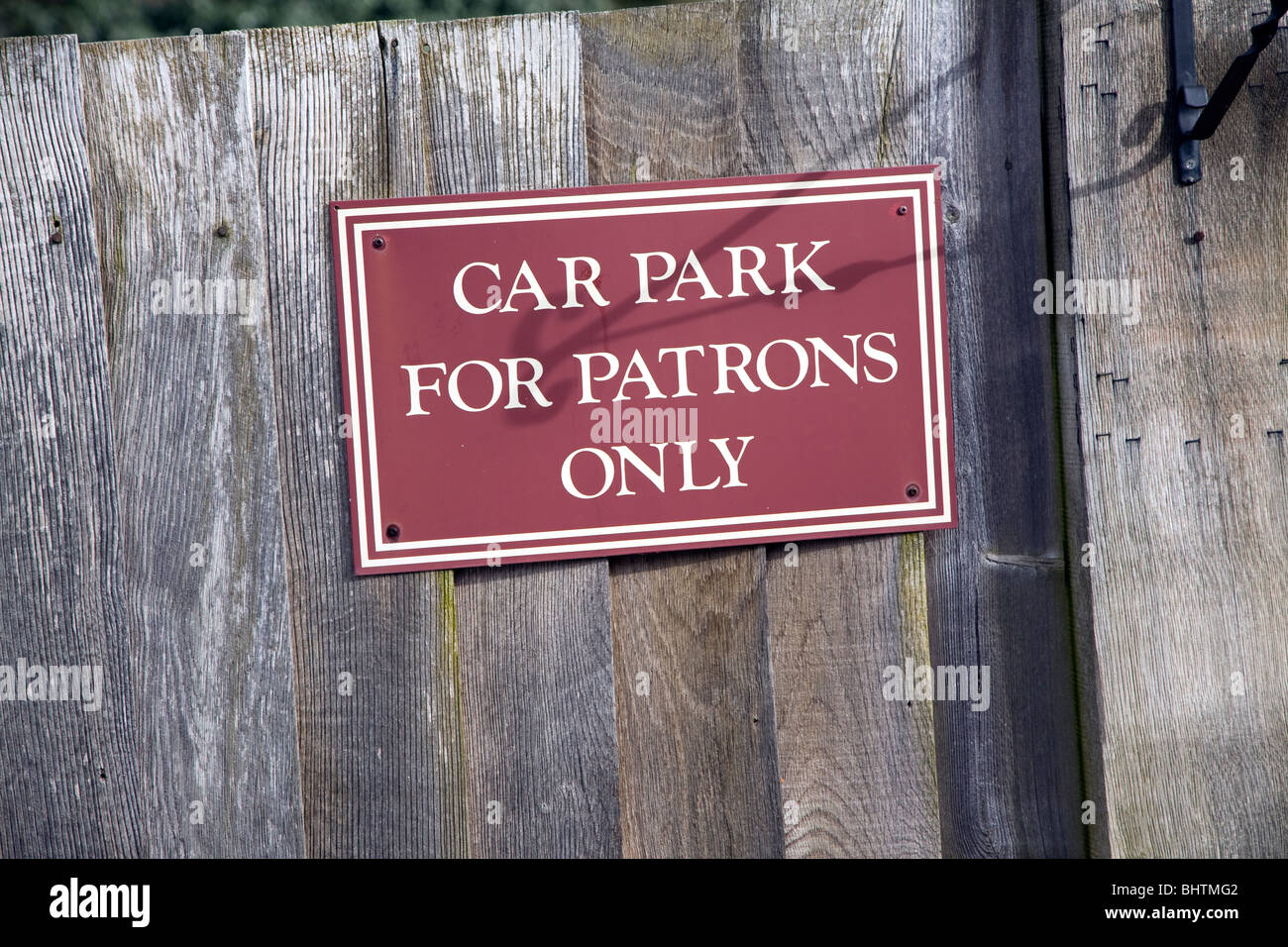 Car Park for Patrons Only sign Stock Photo - Alamy