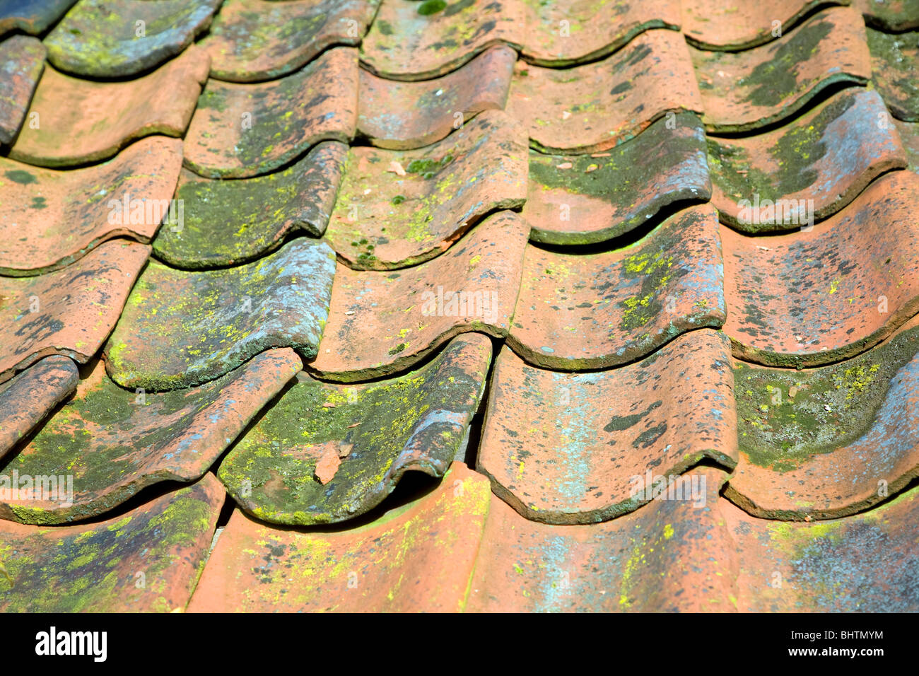 Old clay fired pan tile roof Stock Photo - Alamy