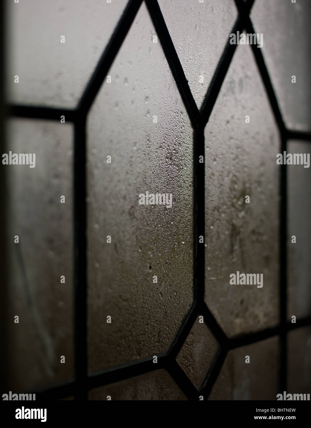 Condensation on lead pane windows Stock Photo - Alamy