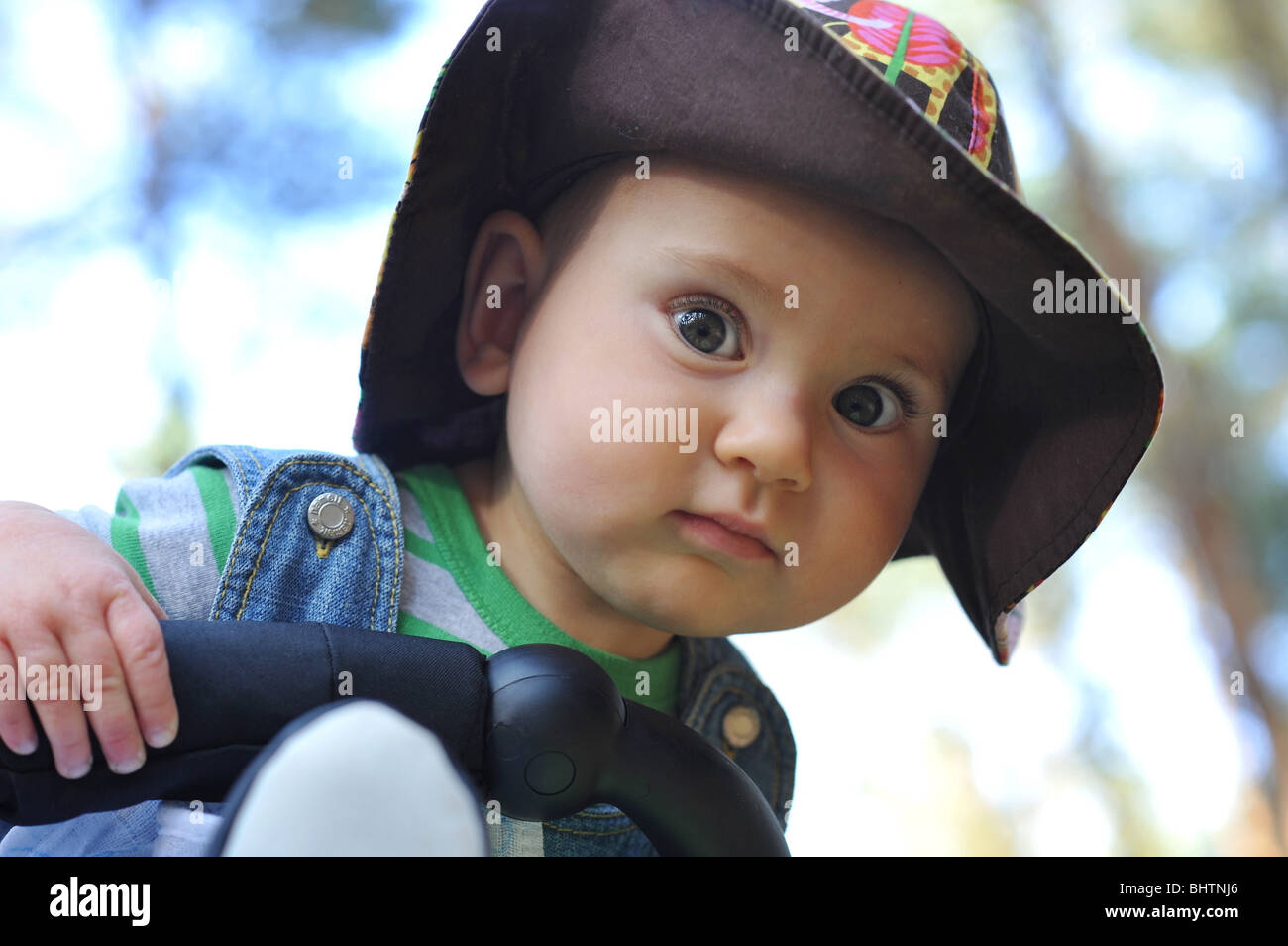 BABY WEARING A HAT Stock Photo - Alamy