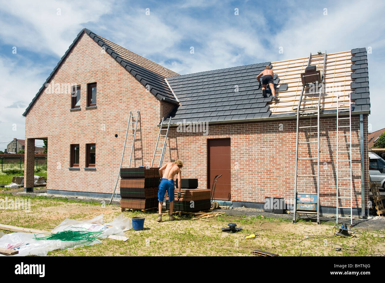 House construction, Roof installation Stock Photo - Alamy