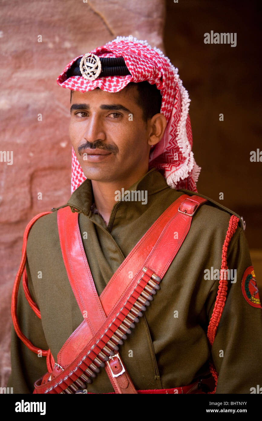 Guard at the Treasury or Al Khaznah at the ancient red rose city of ...