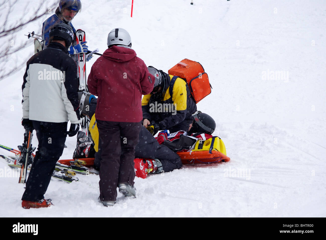 Relief on the ski slopes, accident Stock Photo - Alamy