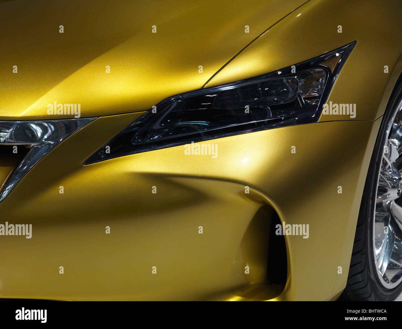 Closeup of exotic gold shiny car Lexus LF-Ch hybrid concept car Stock ...