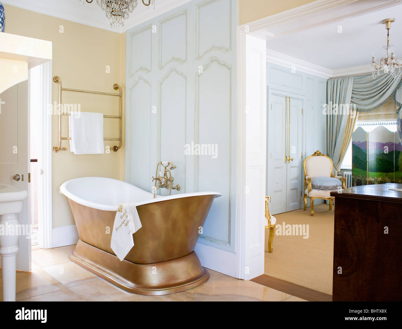 Slipper bath in en-suite bathroom with double doorway to traditional ...