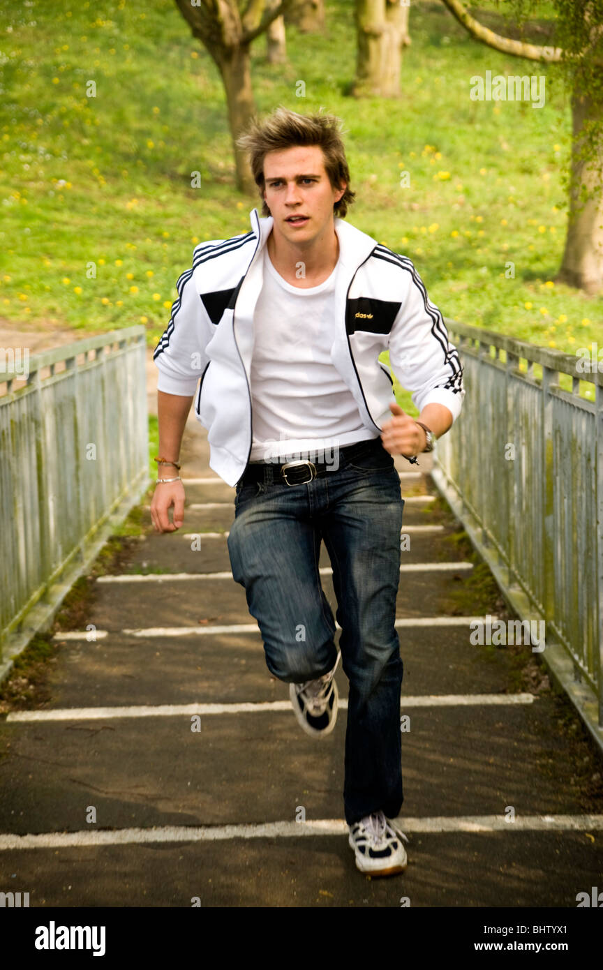 teenage boy running up some steps Stock Photo, Royalty Free Image ...