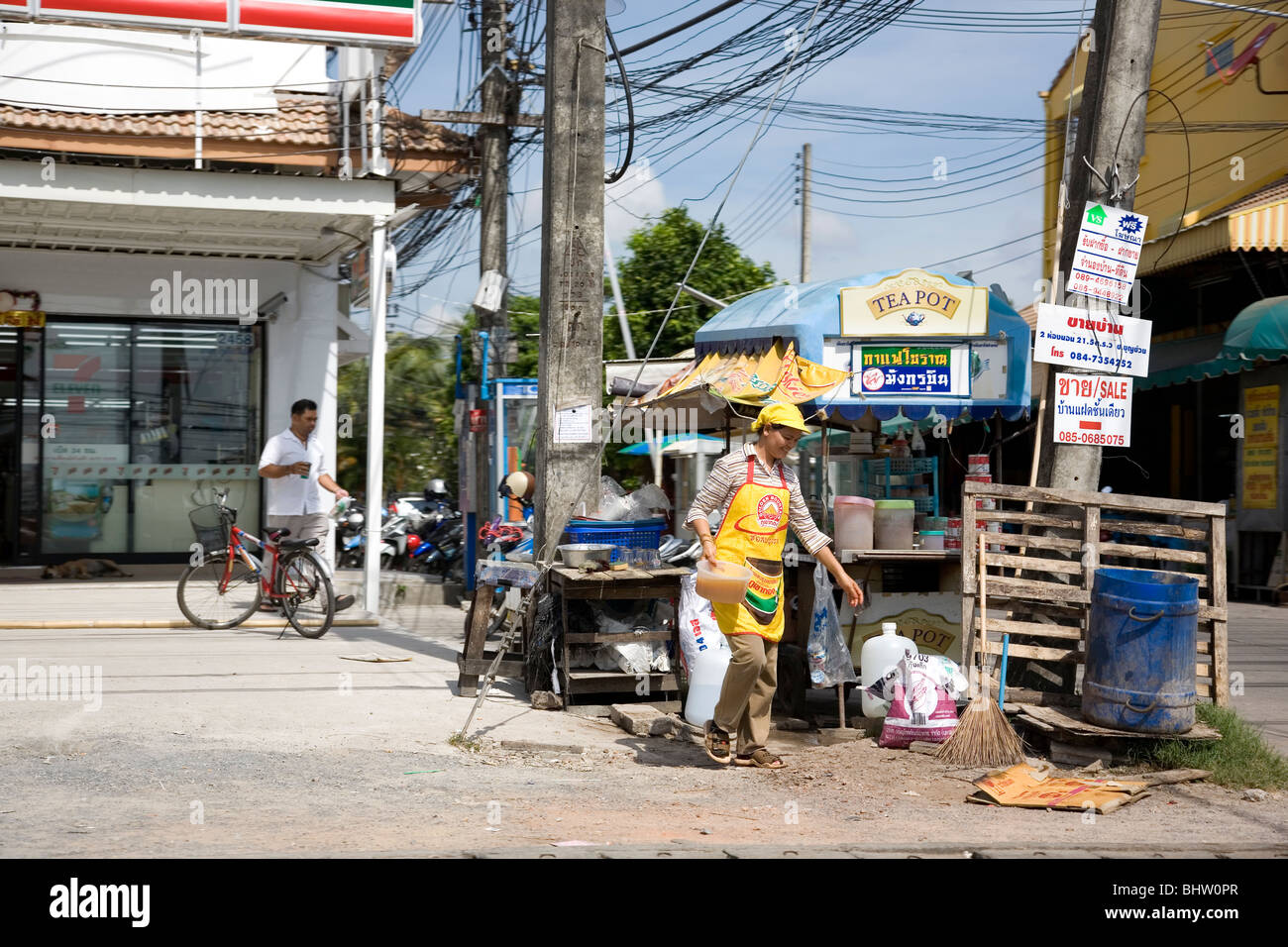 Cooking at a roadside outdoor kitchen - Phuket Stock Photo - Alamy